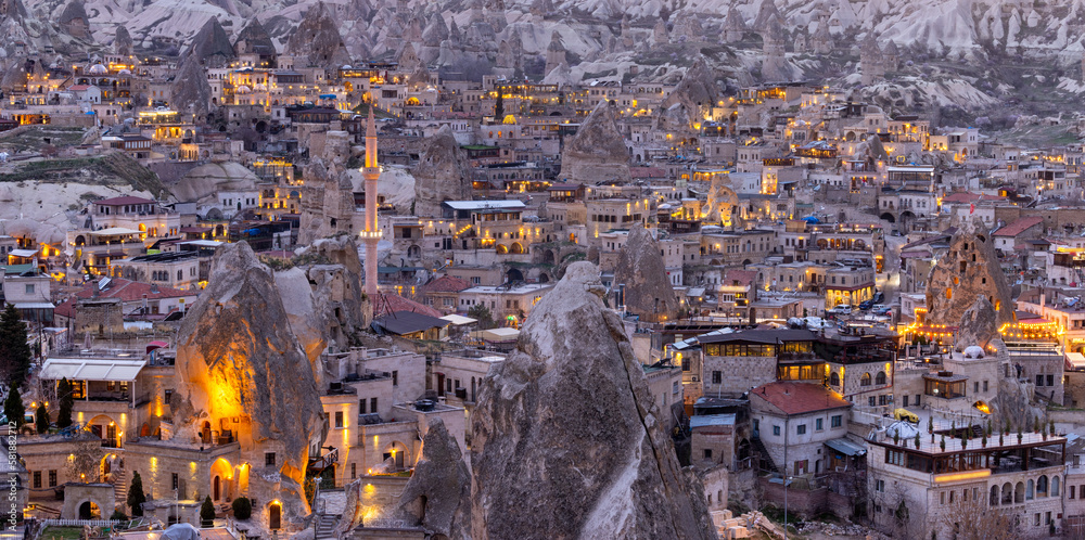 Goreme City at twilight, Famous tourist center of balloon fligths in ...
