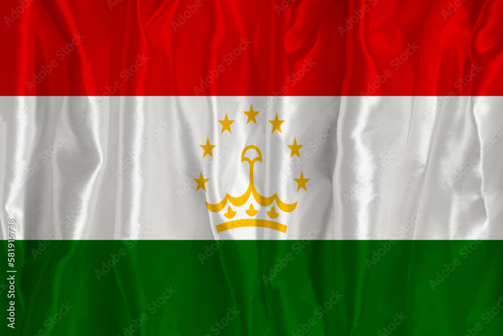 The flag of Tajikistan on a silk background is a great national symbol ...