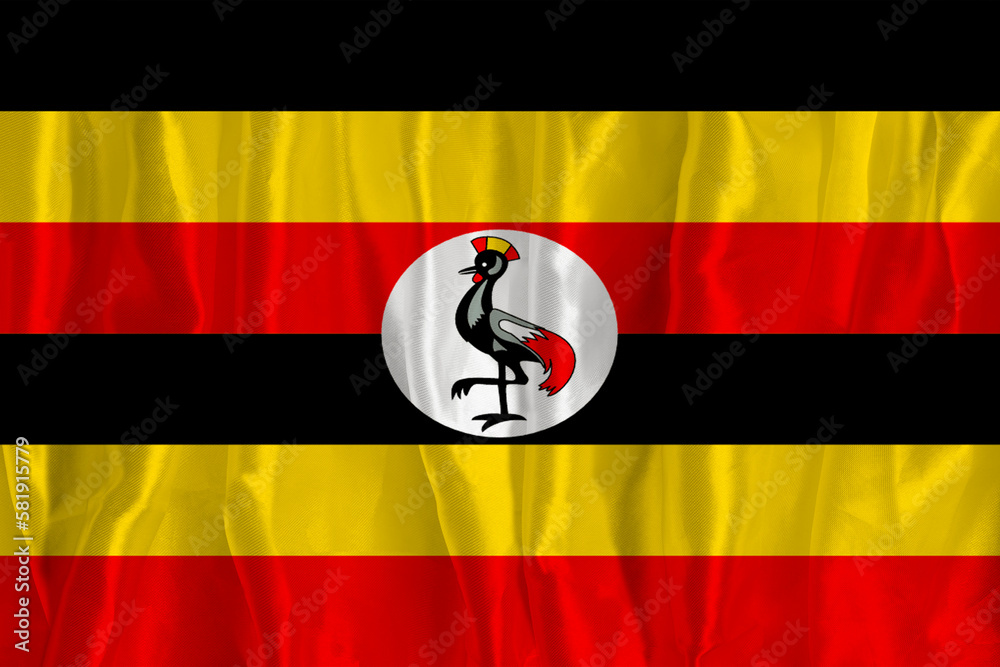 The flag of Uganda on a silk background is a great national symbol ...