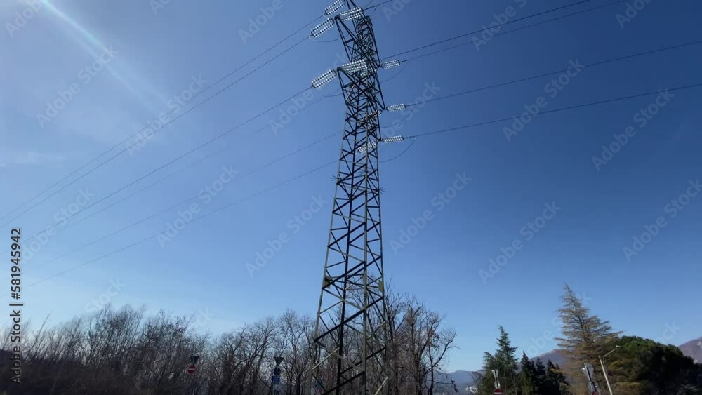 Panoramic view of a high voltage electricity pylon. Iron support for ...