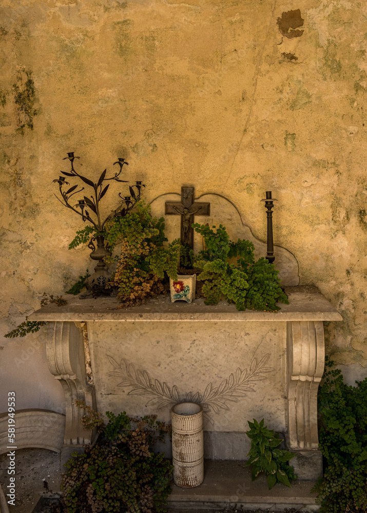 Detail of altar with cross inside burial vault and mausoleum in La ...