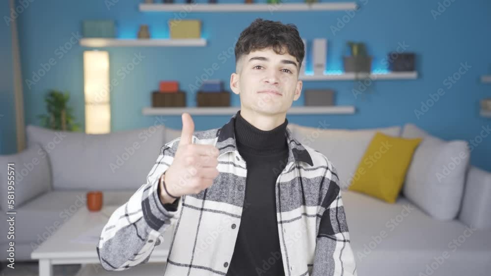 The liking young man is making a like sign, pleased and approving ...