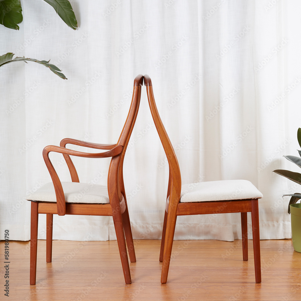 Mid-century modern wooden dining room chairs. Back-to-back view in ...
