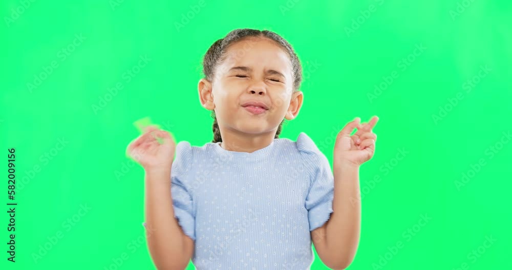 Wideo Stock: Hope, luck and a child with fingers crossed on a green ...
