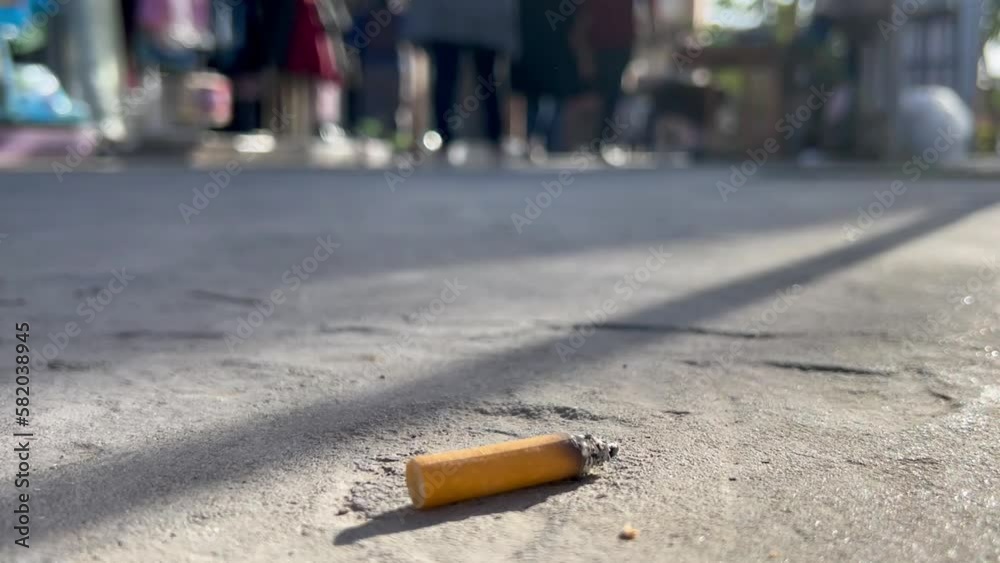 shows how people throw garbage on the street, in this case cigarettes ...