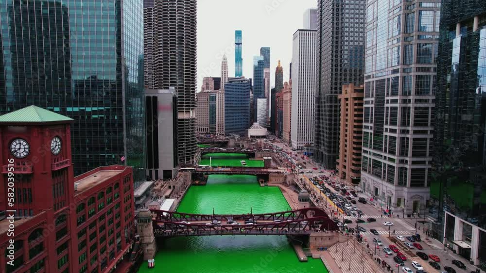 backwards amazing chicago aerial between buildings downtown during the ...