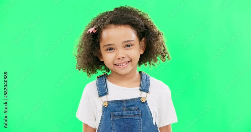 Happy little girl, face and green screen with smile of cute innocent ...