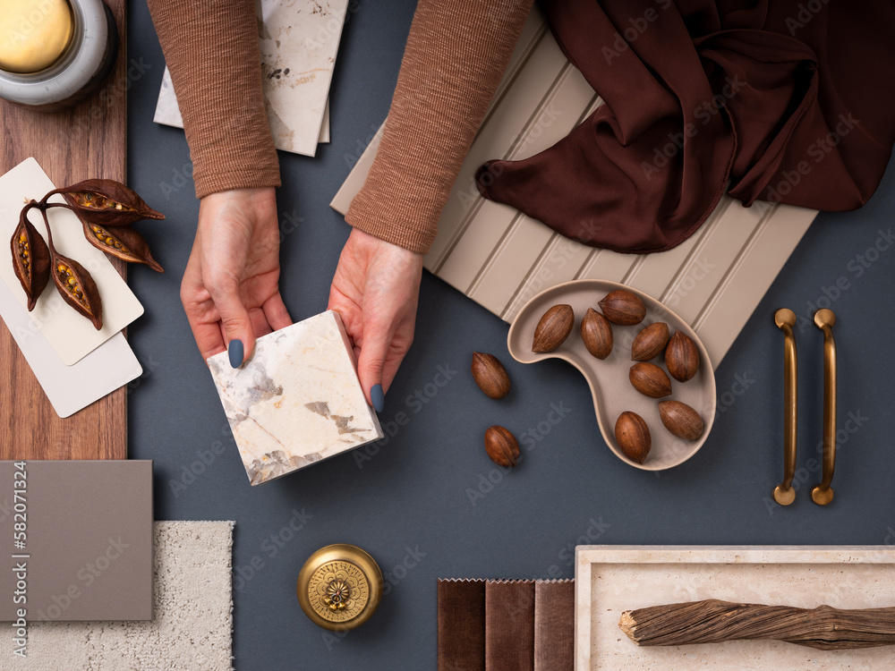 Stylish flat lay composition in navy, brown and beige color palette ...