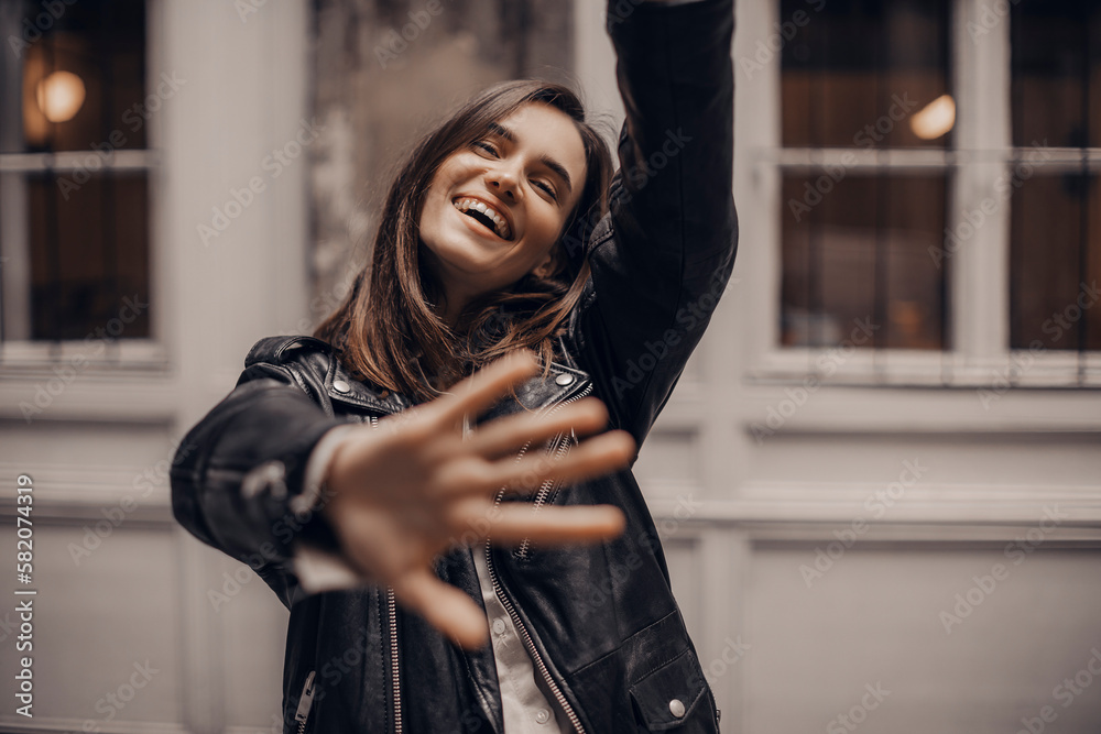 Friendly cute cheerful girl raise hand up high five wanna say hi hello ...