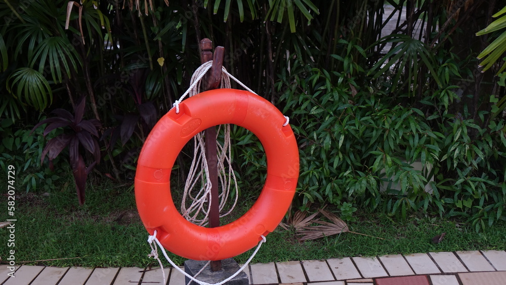 life buoy on the beach, Life tubes in swimming pools and beaches Stock ...