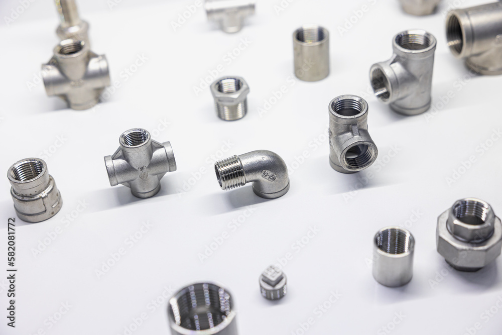 Metal Pipe Fittings or Pipe Connectors Piping and plumbing on white ...