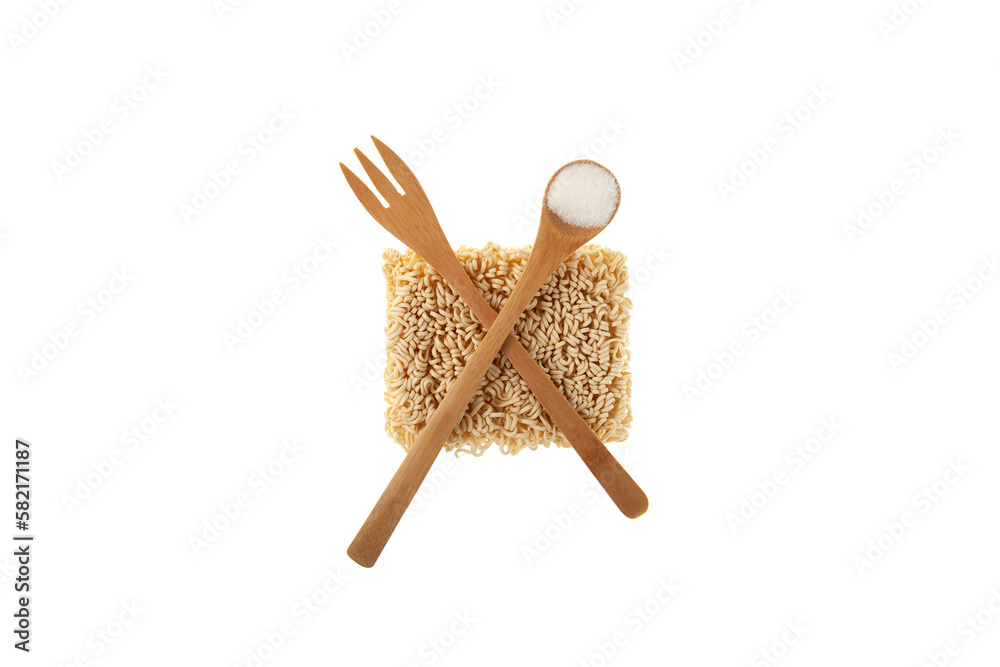Dry pressed instant noodles are abstractly crossed out with fork and ...