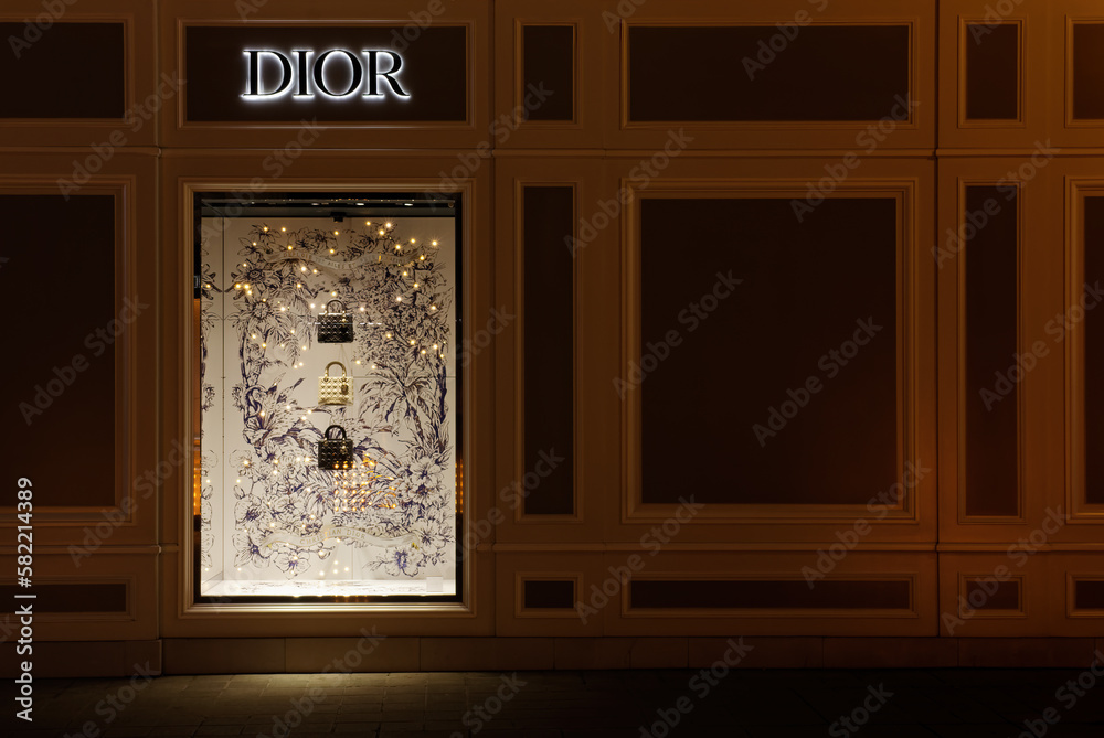 VIENNA, Austria - January 6, 2023: Night View of a shop window of Dior ...