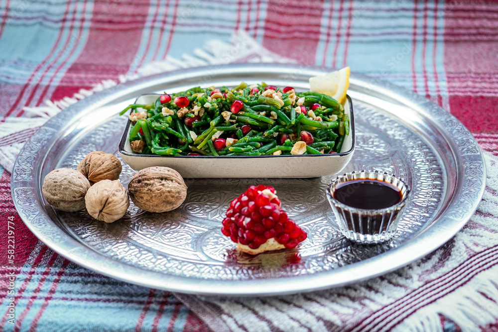 Samphire salad with walnut, pomegranate, lemon, and pomegranate syrup ...