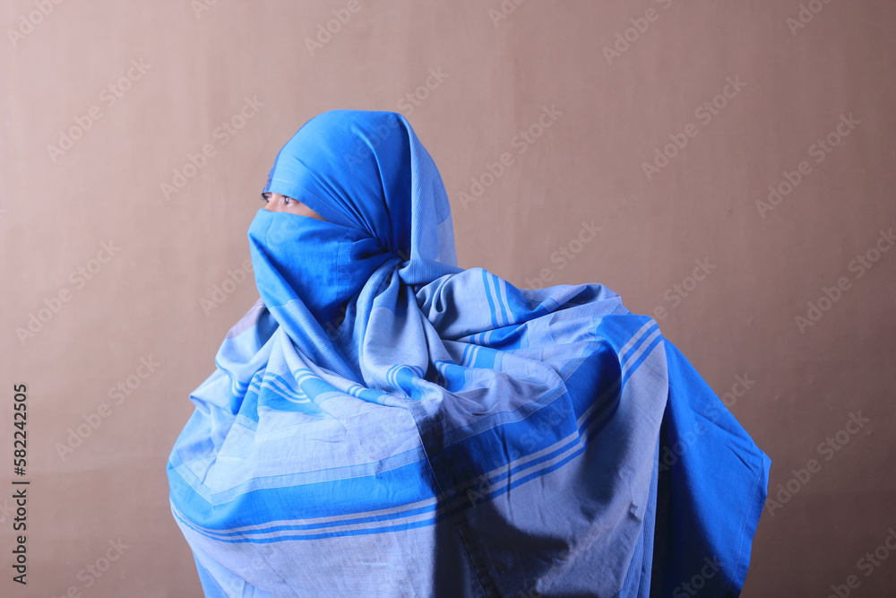 masked thief in blue cloth, side view thief concept portrait, village ...