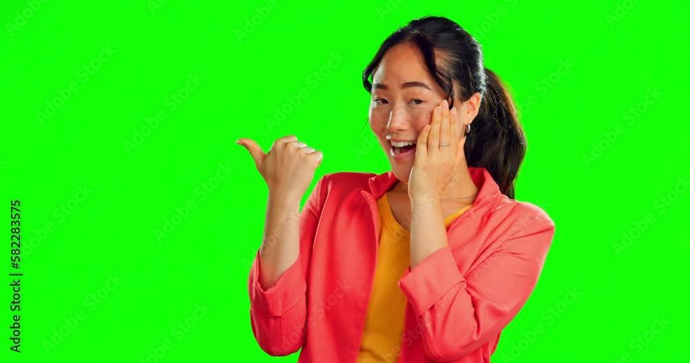 Surprise, pointing and woman in studio with green screen and mockup space for advertising. Shock ...