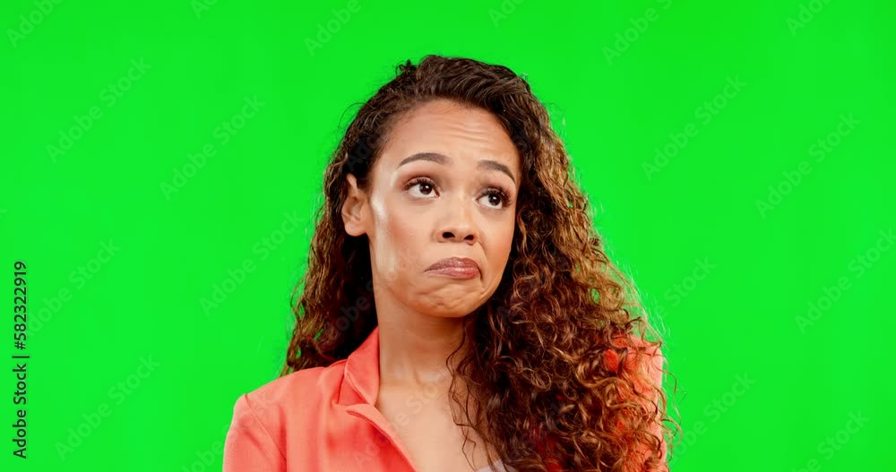 Face, attitude and expression with a woman on a green screen background ...