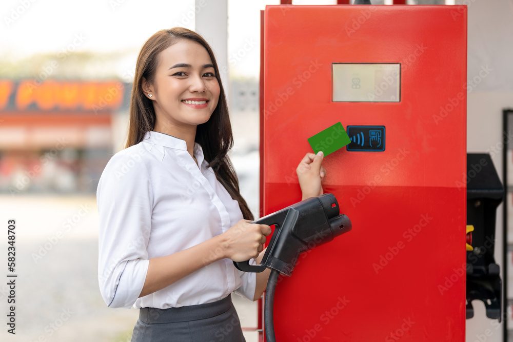 Hand holding calltime refill card or prepaid card to refill money of ...