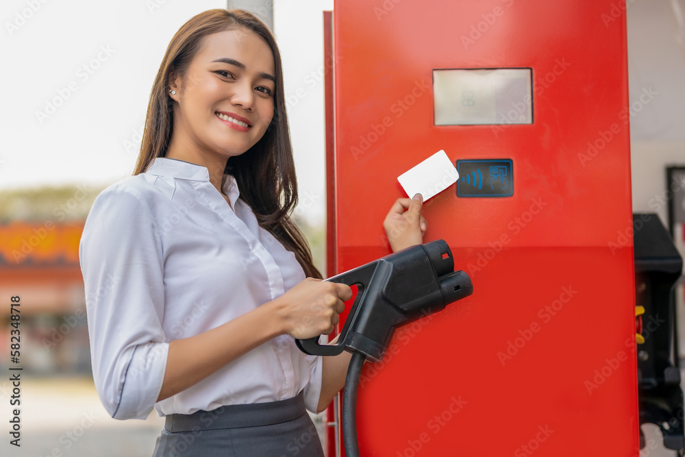 Hand holding calltime refill card or prepaid card to refill money of ...