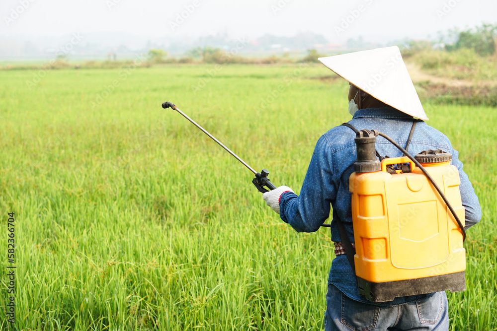 Poster Asian farmer uses herbicides, insecticides chemical spray to get ...
