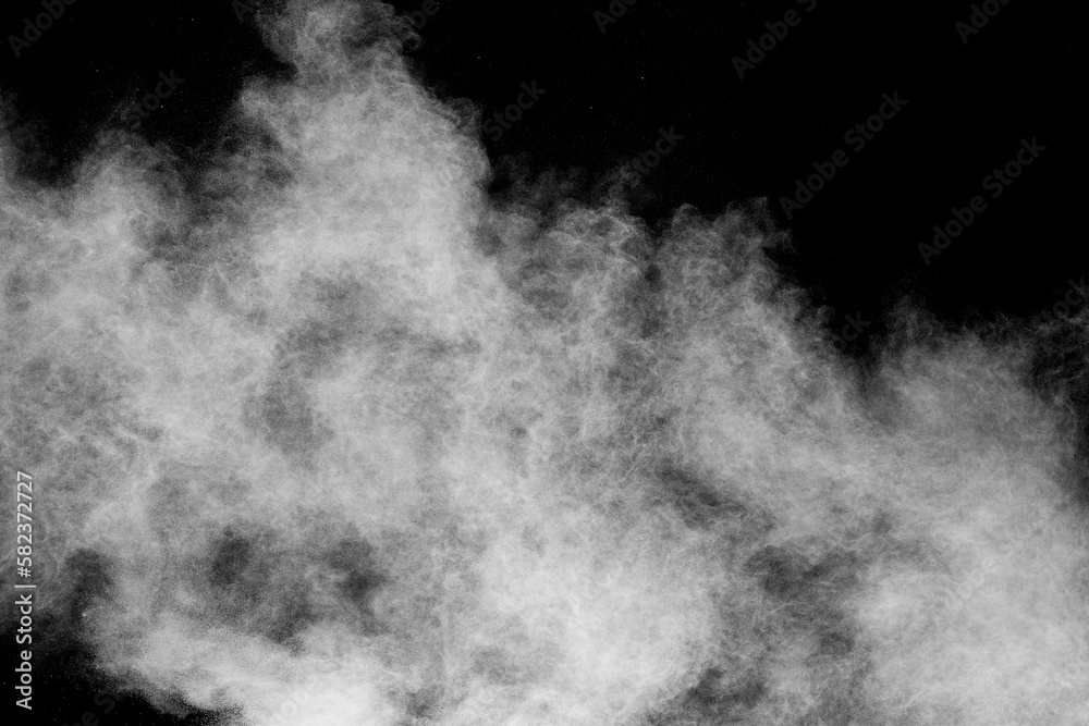 White dust cloud in the air.Abstract white powder explosion against ...