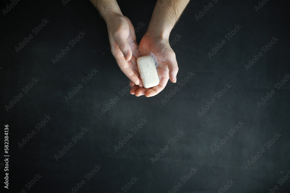 Foto de Bare hands in soapy foam. Hand hygiene. Wash your hands ...