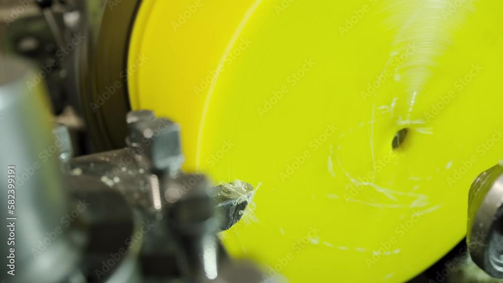 The part is processed with a cutter on a lathe according to the ...
