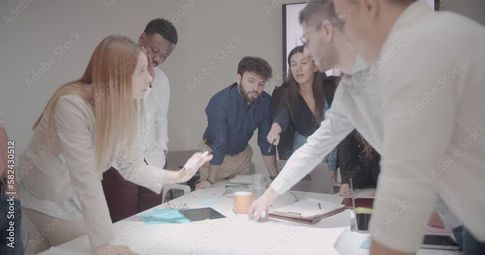 Diverse colleagues engaging for the brainstorming session in the ... Diverse colleagues engaging for the brainstorming session in the ...