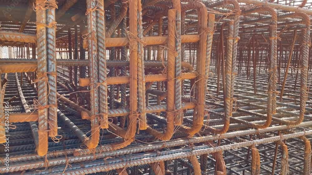 Sunlight into the lens. Industrial background. Rebar texture. Rusty ...