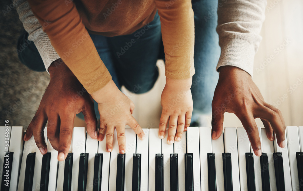 Hands, parent and kid learning piano as development of skills together ...