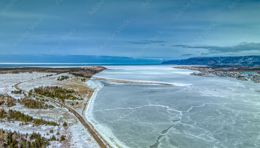 Cheticamp Harbour with winter ice. The view is north facing with the ...