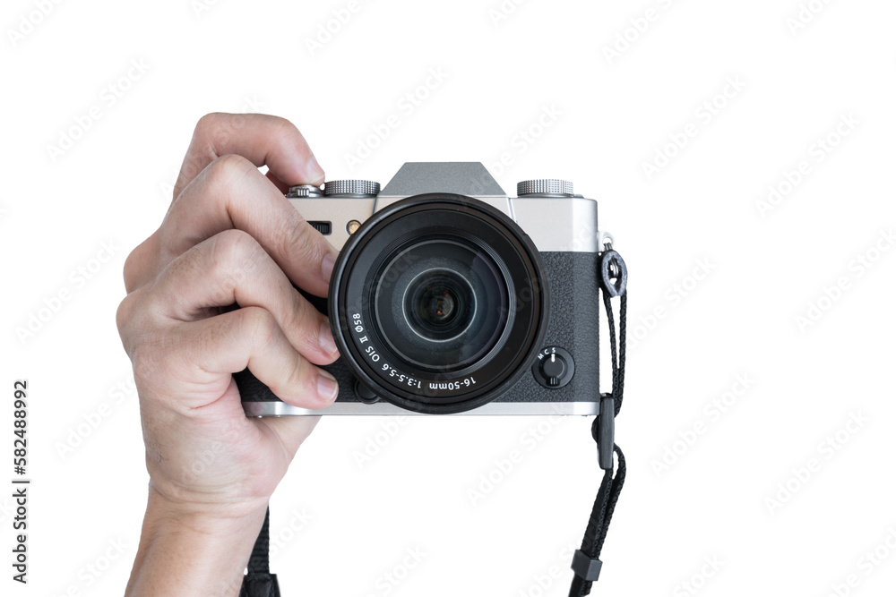 Hand holding vintage camera shooting front view isolated on transparent ...