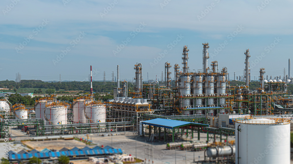 Landscape of chemical plant during daytime with blue sky showing large ...