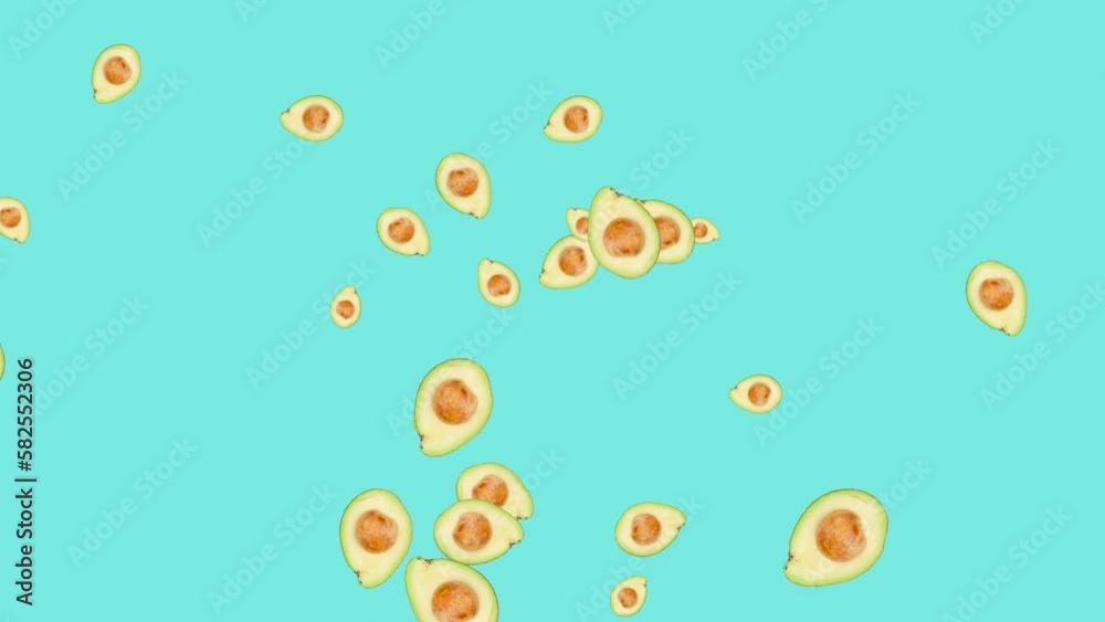 abstract explosion with half of avocado flying in different directions ...