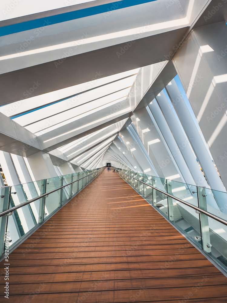Dubai Water Canal Helix Bridge, pedestrian bridge with water taxi, in ...