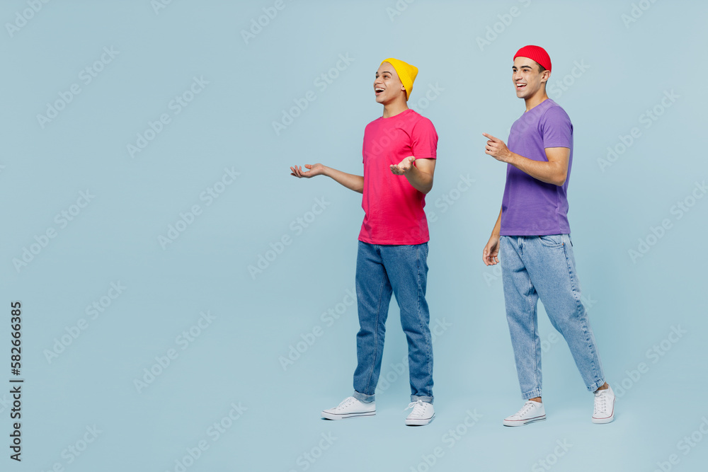 Full body smiling happy fun cool cheerful young couple two buddies ...