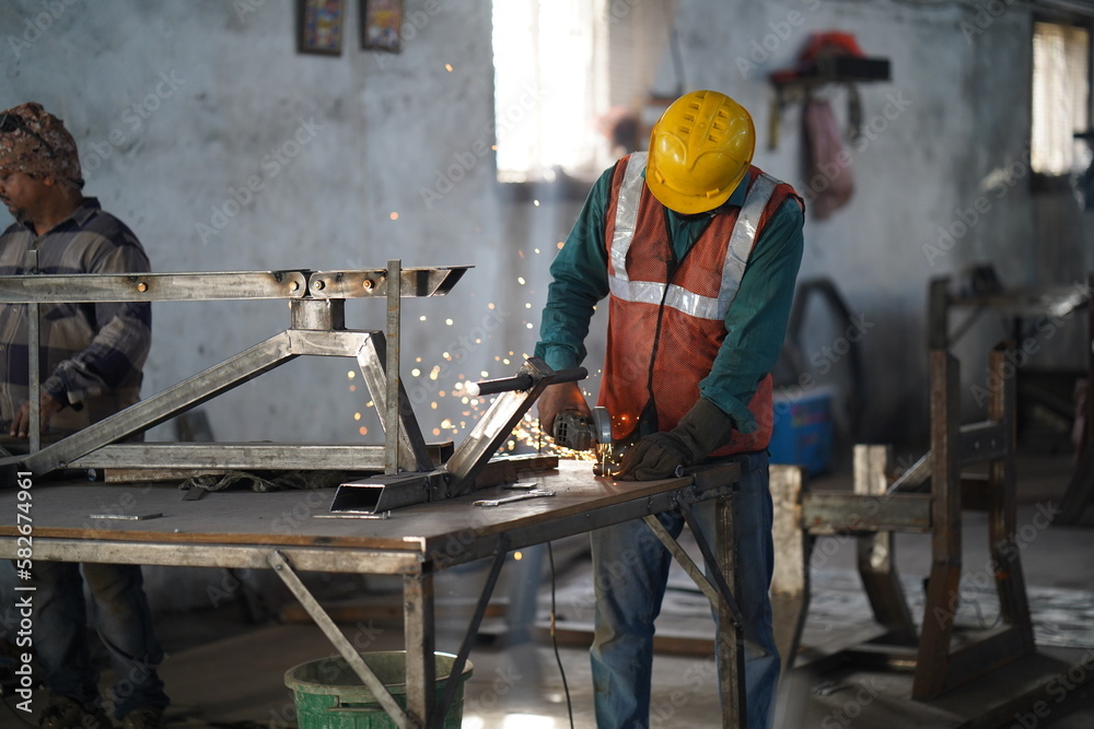 Foto de Working with Power Tools - Stock photo of Man Using Angle ...