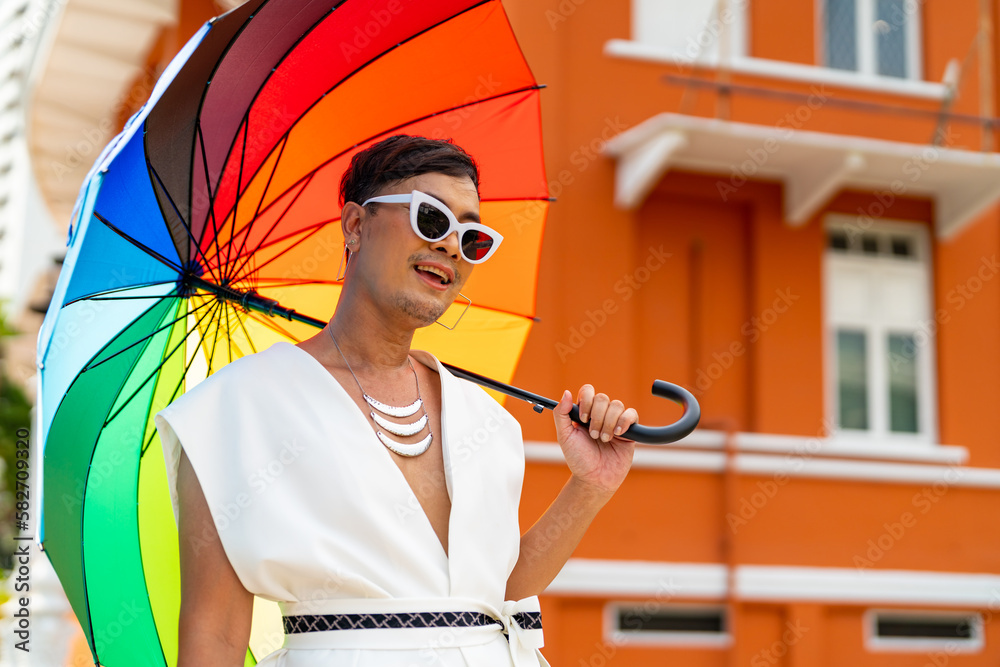 Asian guy drag queen in woman clothes, makeup and sunglasses holding ...