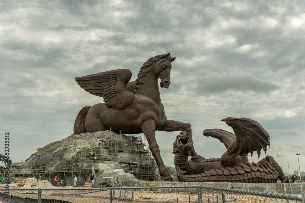 Sculpture in Miami. Pegasus and Dragon is a 100 foot tall statue of ...