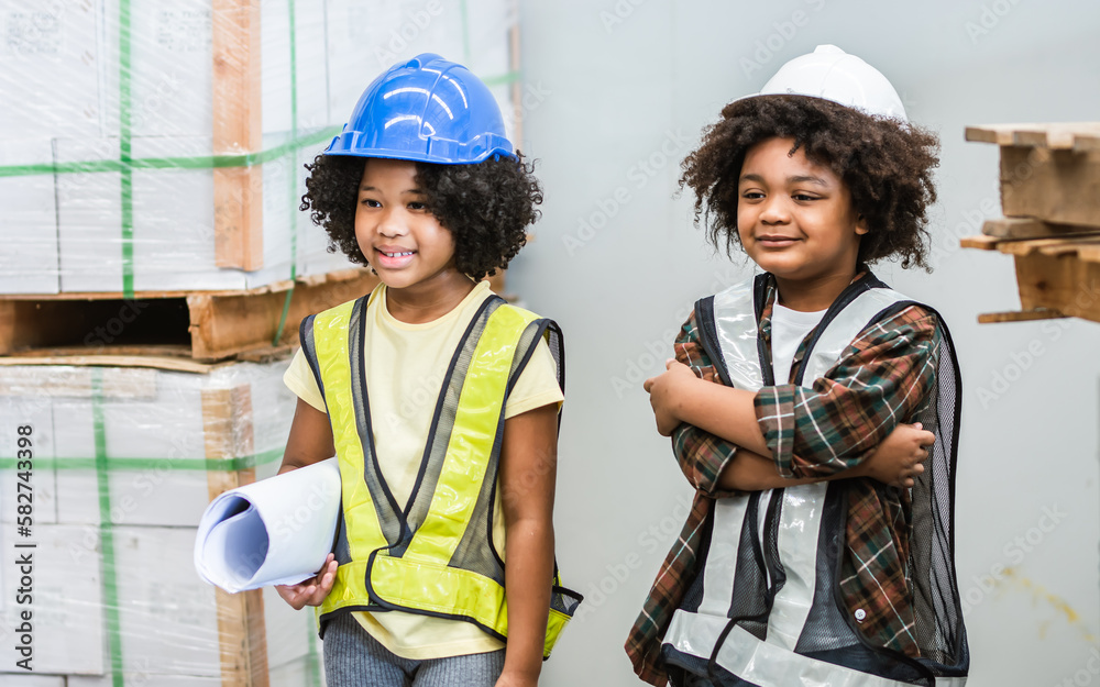 Two African little boy, girl kids standing in warehouse, dream to be ...