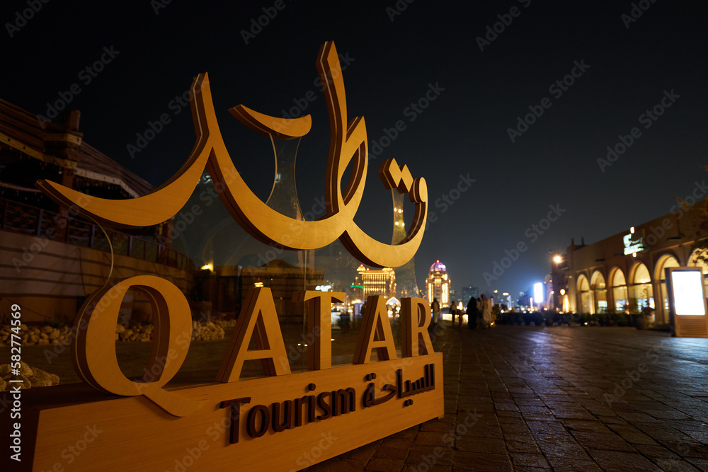 DOHA, QATAR - CIRCA MARCH, 2023: street level view of Qatar sign seen ...