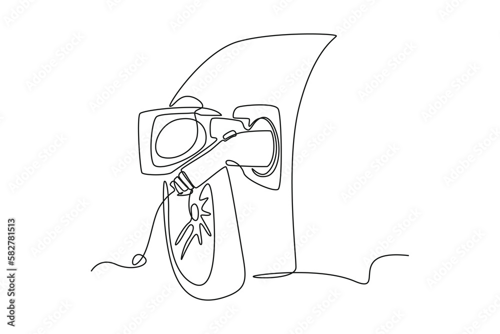 Continuous one-line drawing electric car is being charged at the ...
