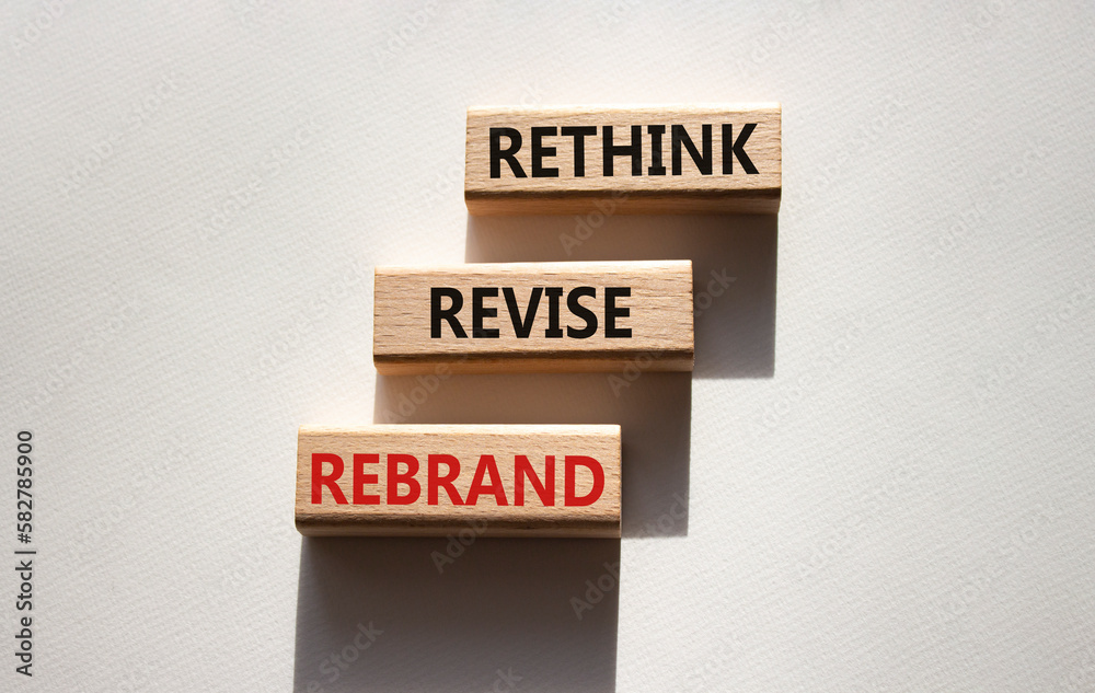 Rethink Revise Rebrand symbol. Wooden blocks with words Rethink Revise ...