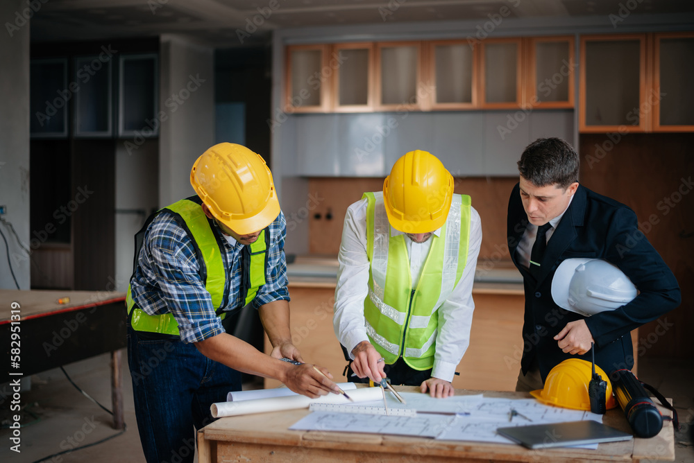 Engineer teams meeting working together wear worker helmets hardhat on ...