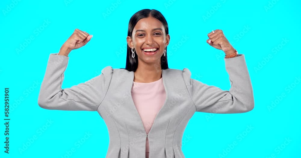 Happy business woman, face and flex arms in studio, blue background and ...