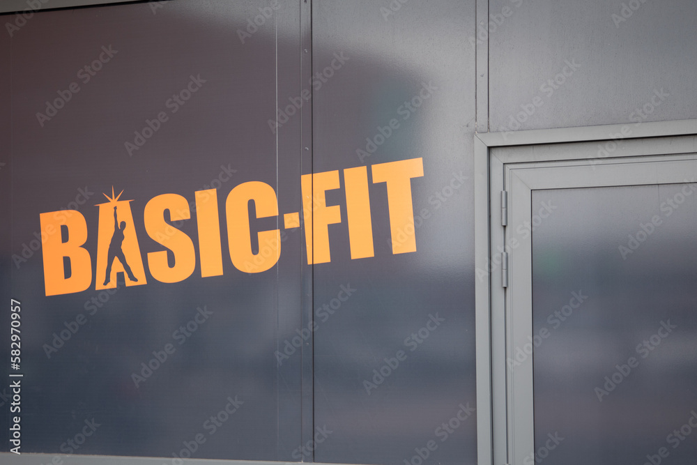Basic-Fit facade sport fitness club sign brand and text logo of Basic ...
