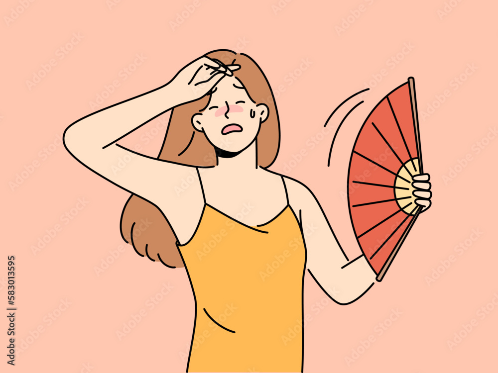 Unhealthy woman with handfan suffer from heatstroke during hot weather ...