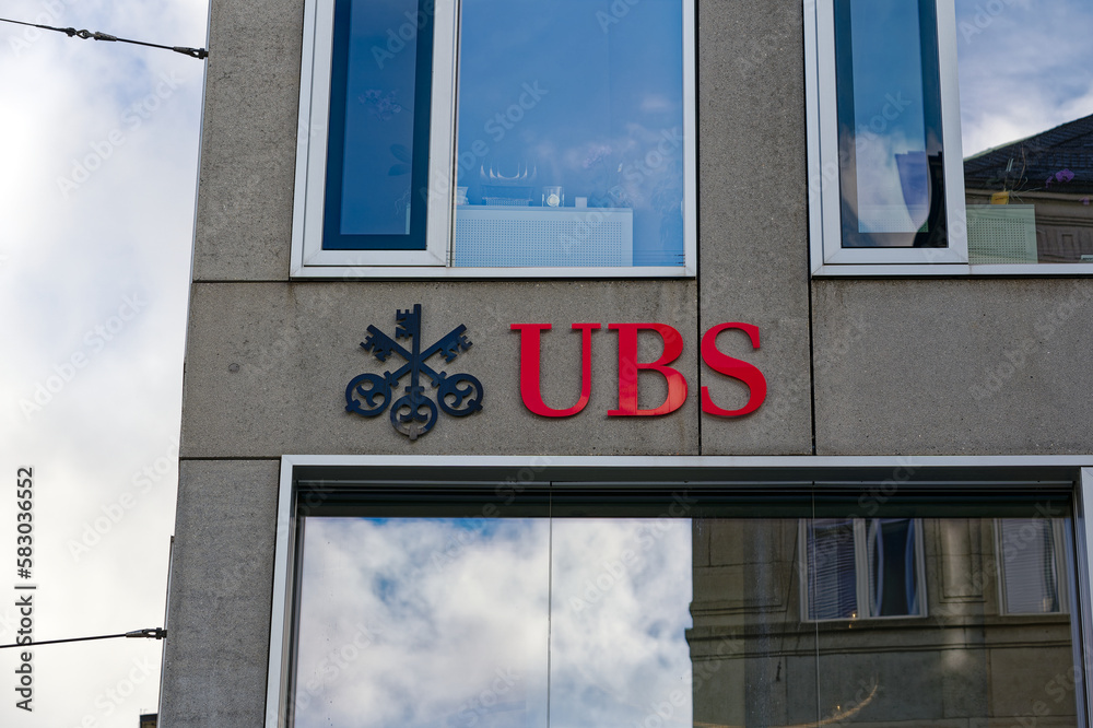 Close-up of logo of Swiss bank UBS at City of Zürich at day after ...