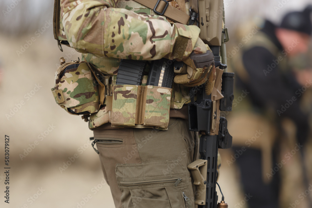 Ukrainian solider equipped with modern American assault rifle training ...
