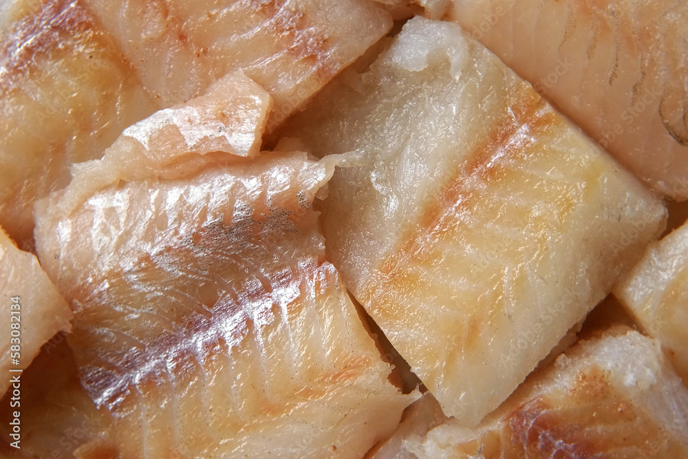 Raw fish fillet is spinning. Top view. Slices of fresh whitefish. Full ...